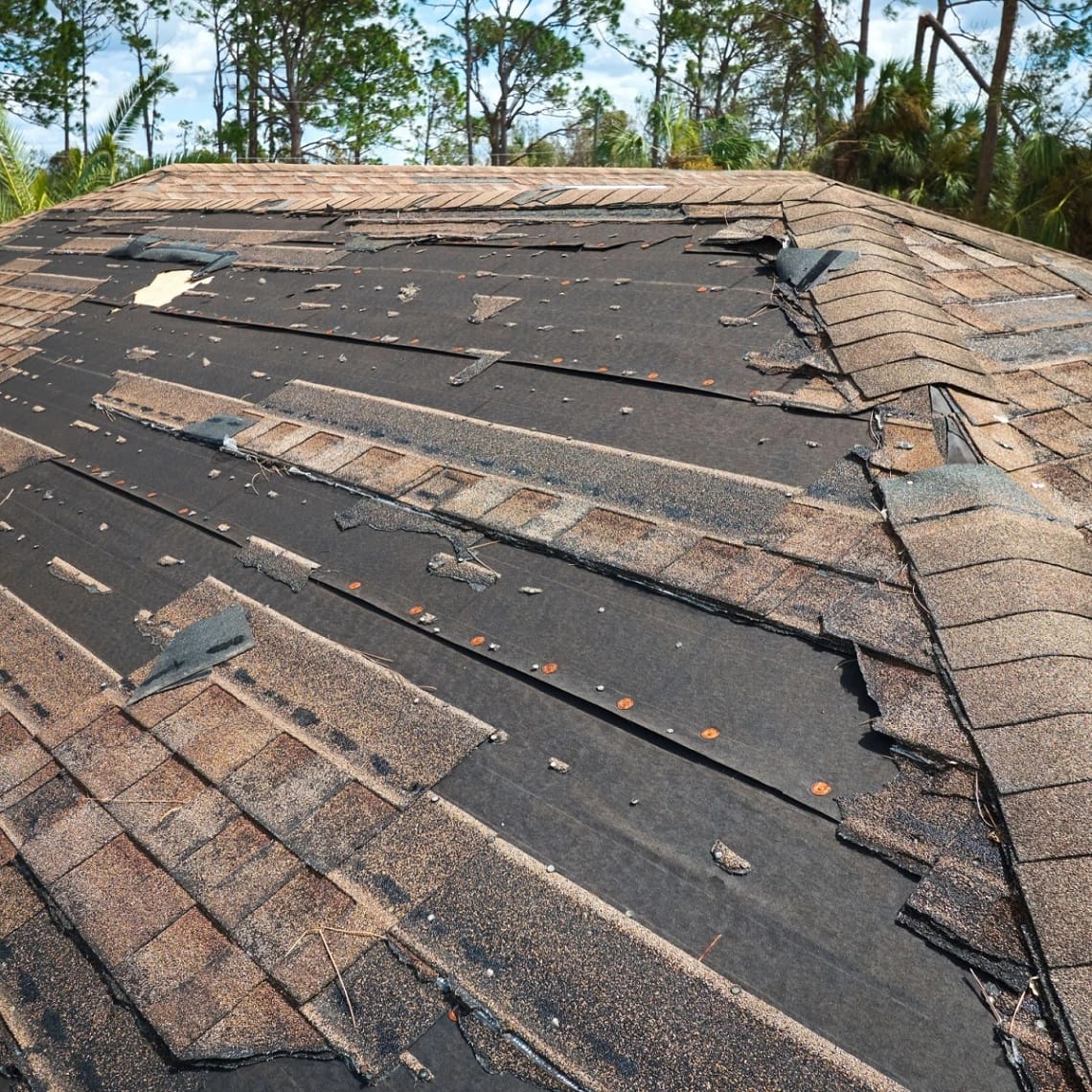 Signs of Rosenberg Roof Damage Caused by Wind - Amstill Roofing Company