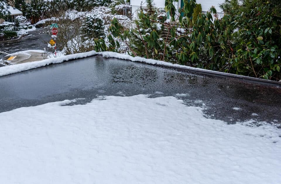 Flat Roof Snow Removal Guide (3 Best Methods)