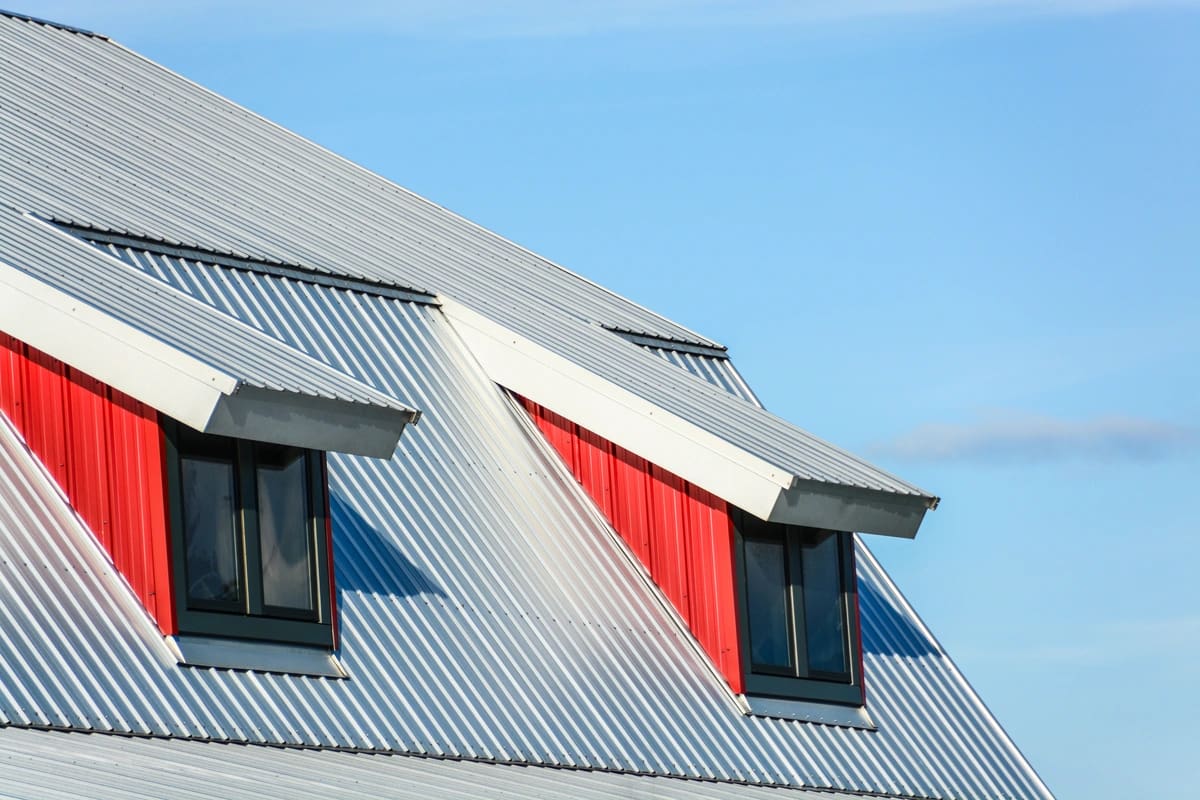 A Homeowner's Guide To Painting A Metal Roof | Roof Troopers