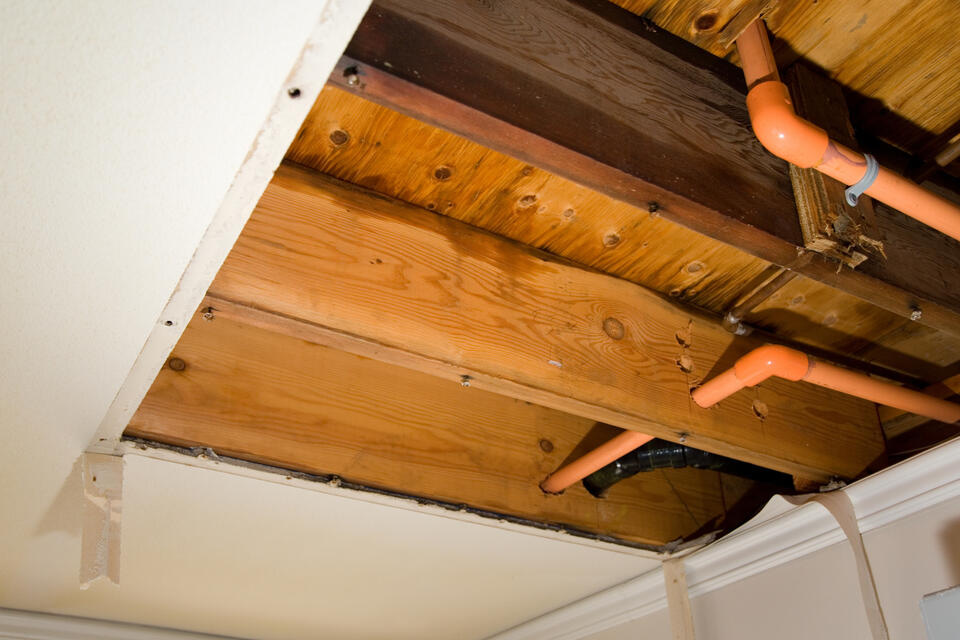 Water Leaking From Ceiling? (What It Means & How To Fix It)